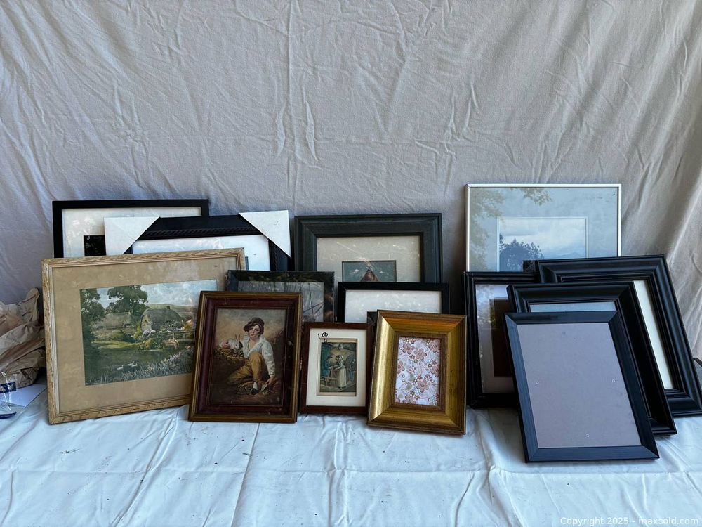 Assorted picture frames with prints | Maxsold