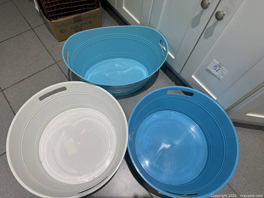 Three large flexible plastic storage tubs | Maxsold