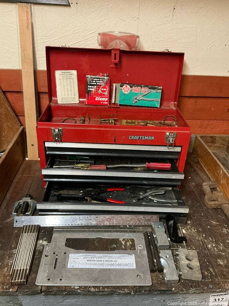 Craftsman red metal toolbox with assorted hand tools | Maxsold