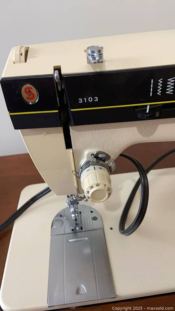 Singer 3103 sewing machine, table, bench | Maxsold