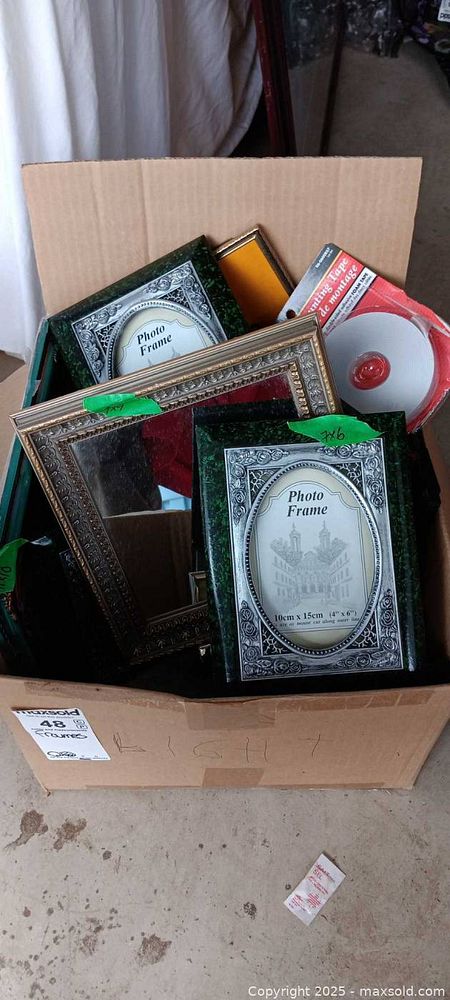 Assorted picture frames and 9x9 in square mirror | Maxsold