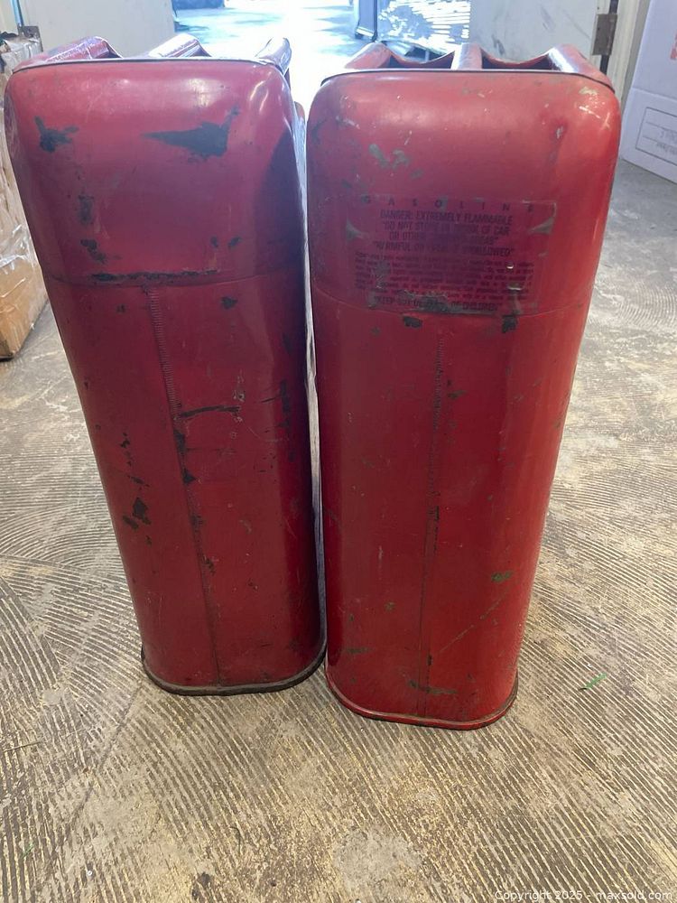 Pair of 5-Gallon Red Steel Jerry Gas Cans | Maxsold
