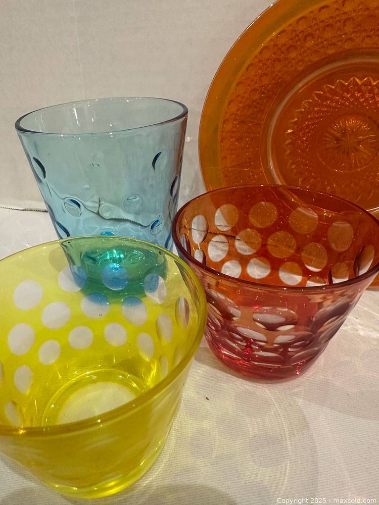 Polka dot glass tumblers and amber plates | Maxsold