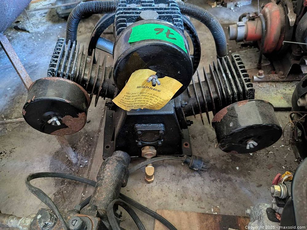3-cylinder cast-iron air compressor pump | Maxsold