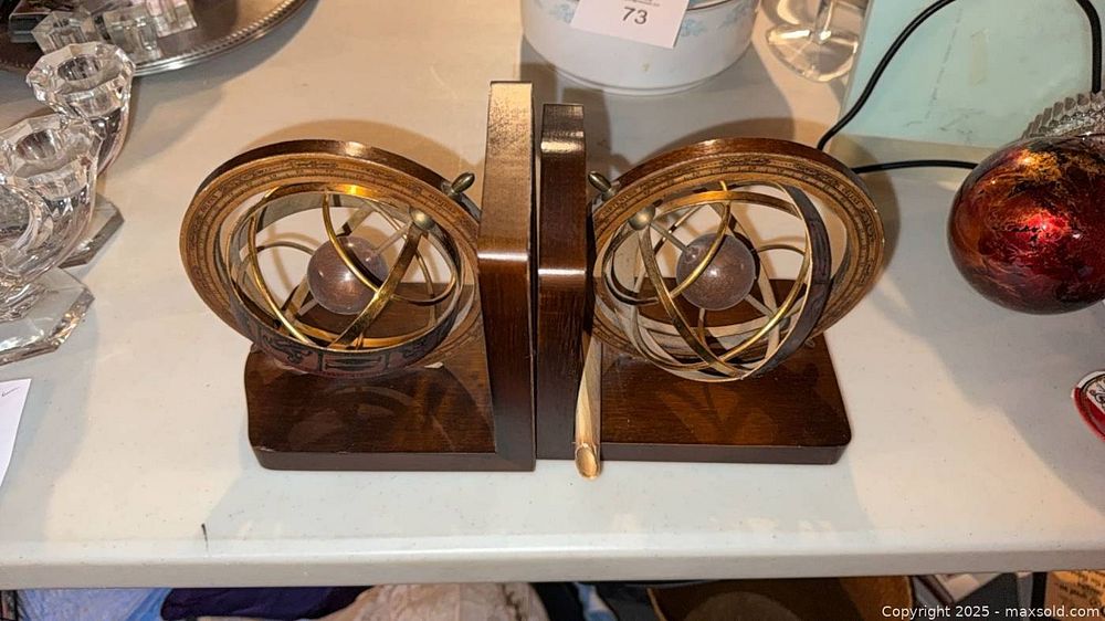 Pair of Armillary Sphere Bookends | Maxsold