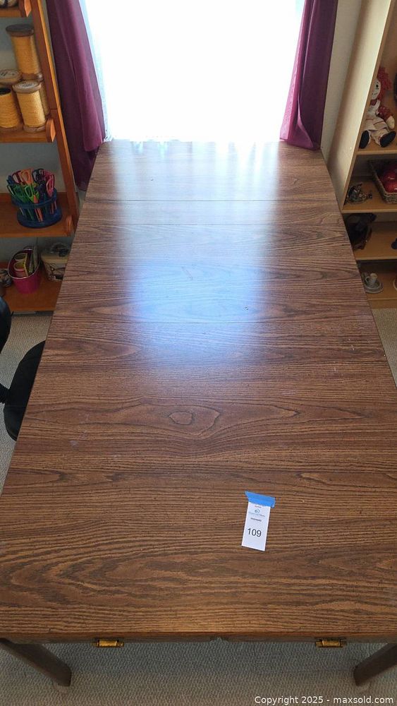 Rectangular craft table, quilting rulers, cutting mats, chair | Maxsold