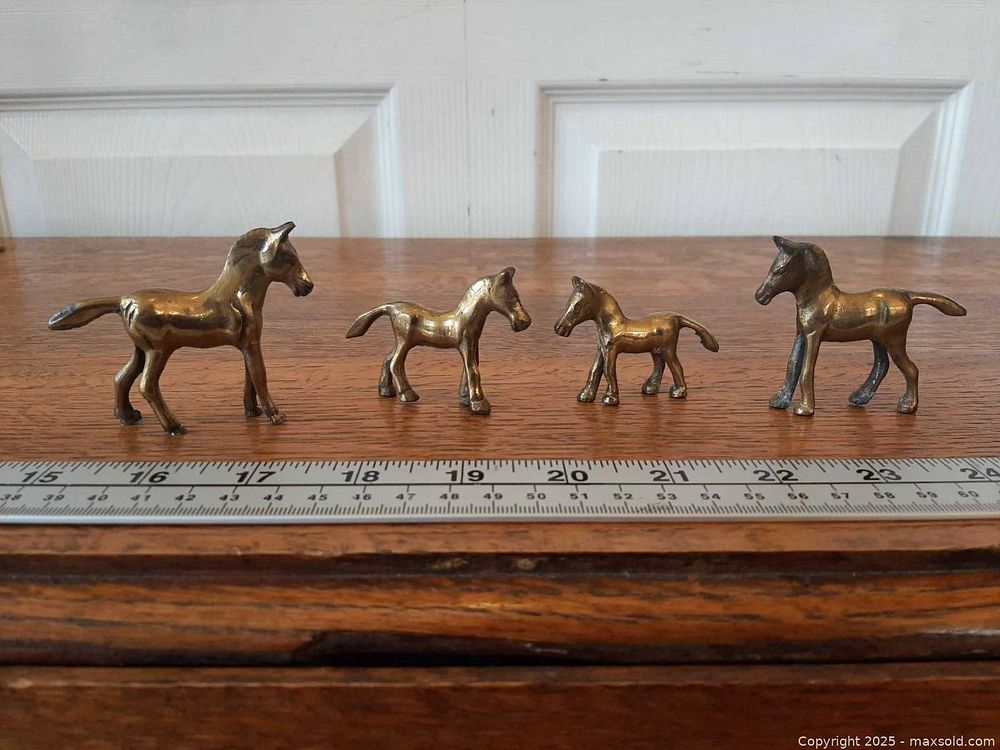 Four miniature solid brass horse figurines | Maxsold