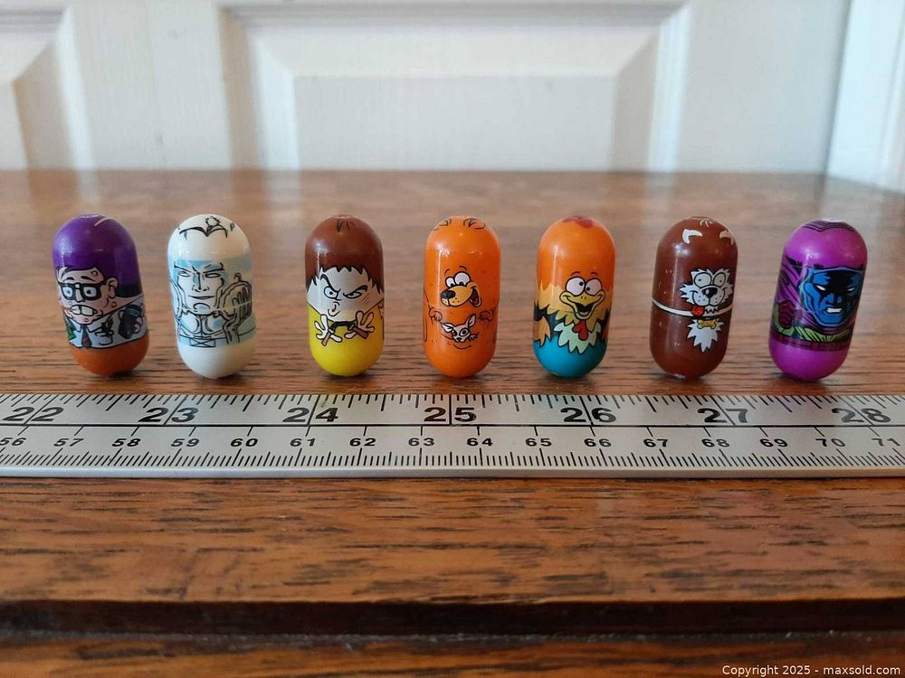 Seven Mighty Beanz collectible capsules | Maxsold