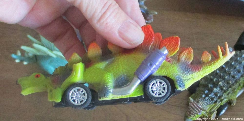 Vintage mixed toy assortment, pull-back dinosaur cars, Linus fridge ...