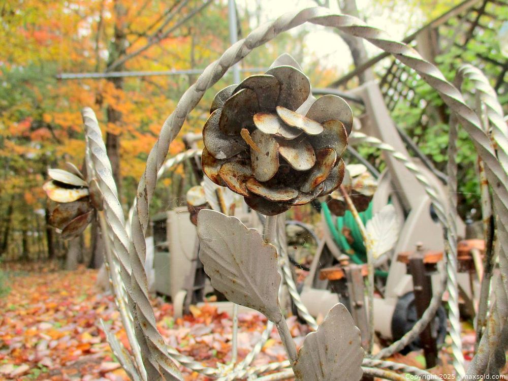 Silver metal rose plant holder | Maxsold