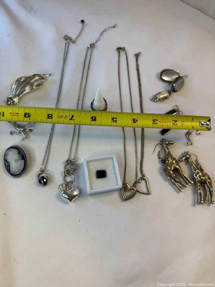 Mixed silver-tone vintage jewelry lot | Maxsold
