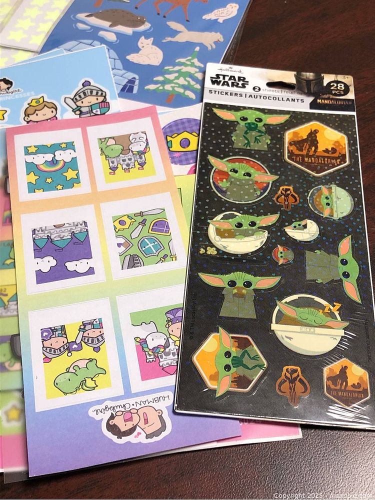 Assorted new sticker packs | Maxsold