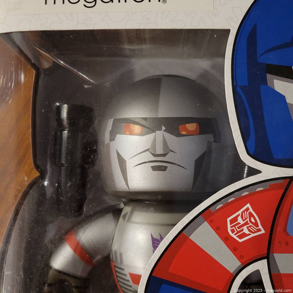 Mighty Muggs Transformers Universe Megatron figure | Maxsold