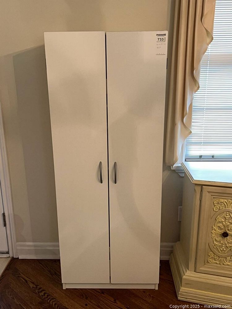 White Two-Door Storage Cabinet 24x12x60 | Maxsold