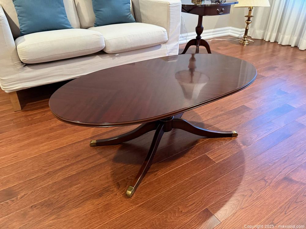 Vintage oval wood coffee table | Maxsold