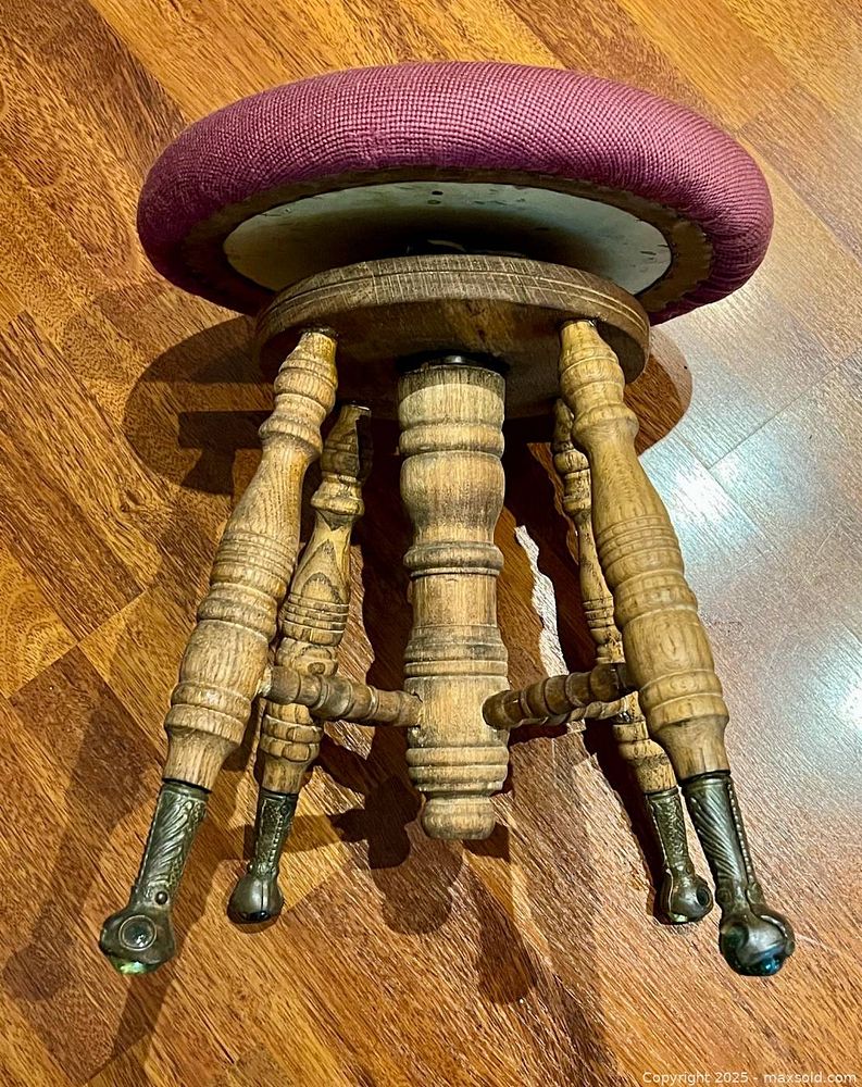 Antique wooden piano stool with claw feet | Maxsold