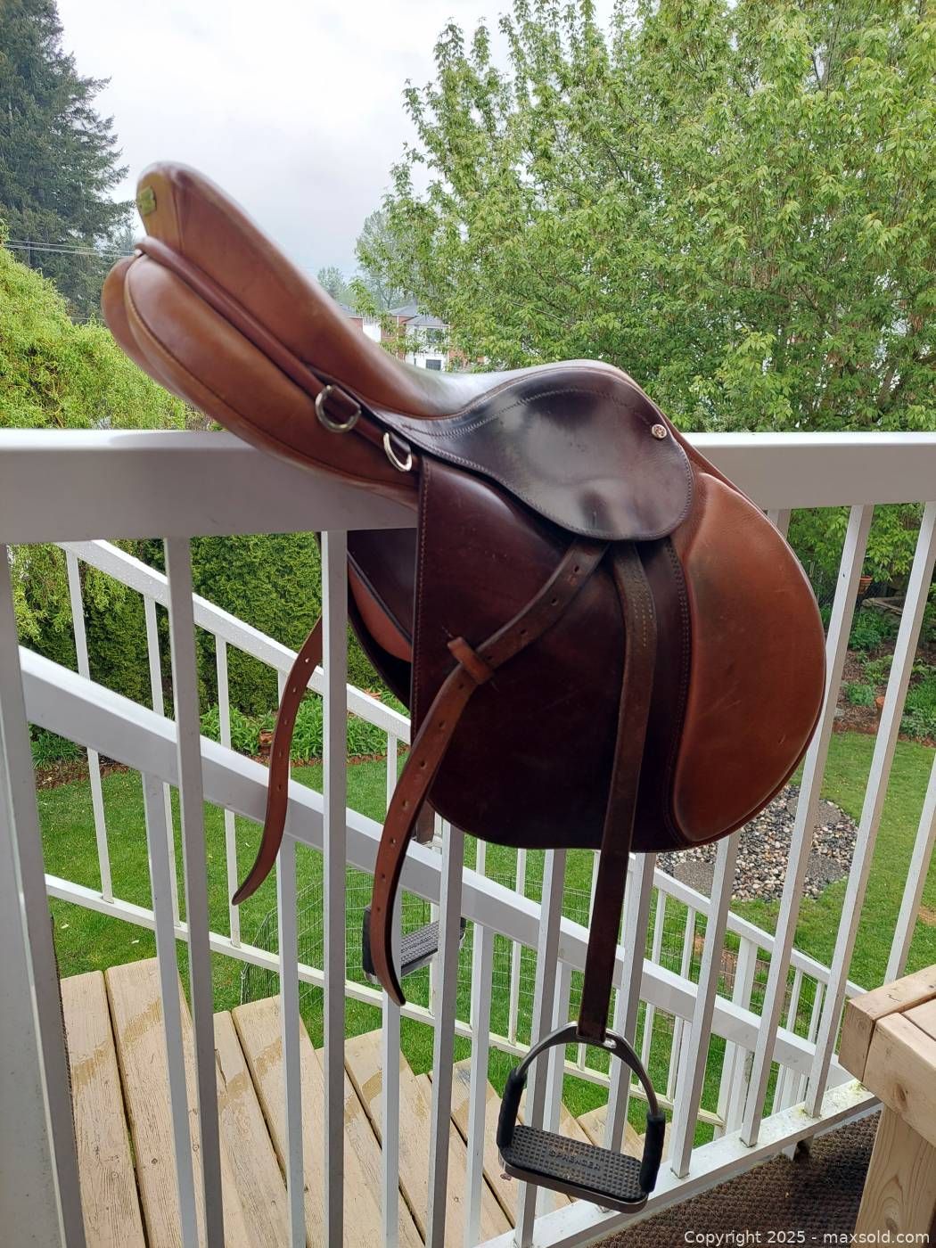 Courbette Swiss leather dressage saddle with Sprenger stirrups | Maxsold