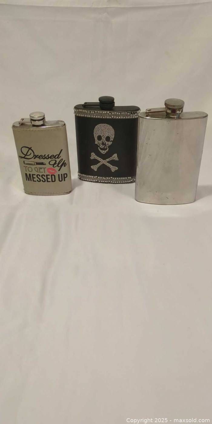 Three Stainless Steel Drinking Flasks | Maxsold