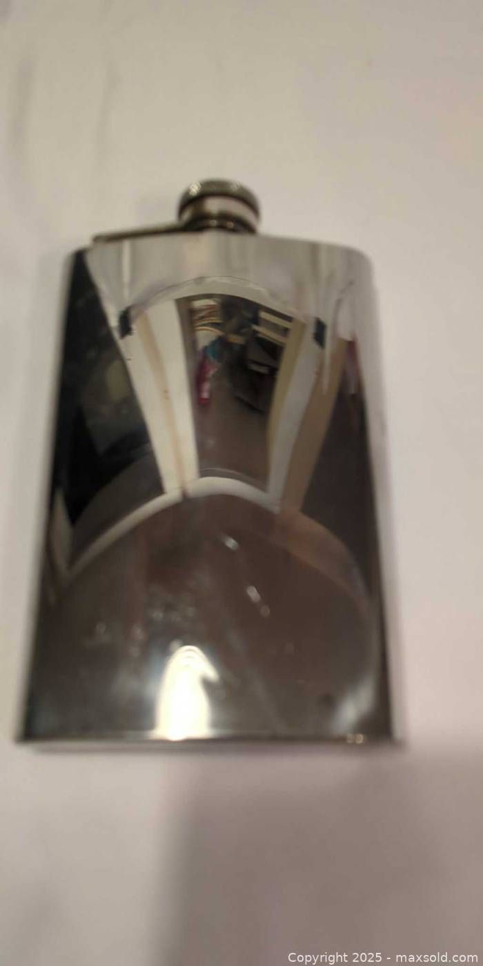 Three Stainless Steel Drinking Flasks | Maxsold