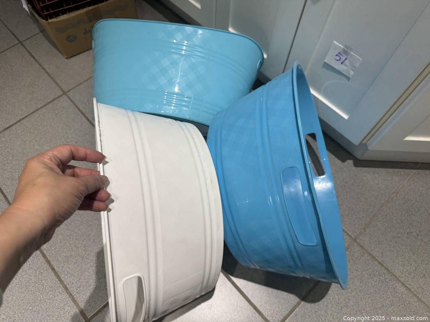 Three large flexible plastic storage tubs | Maxsold