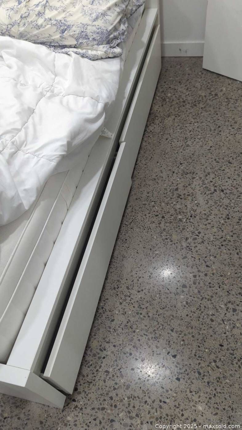 IKEA full platform bed frame with 4 storage drawers | Maxsold