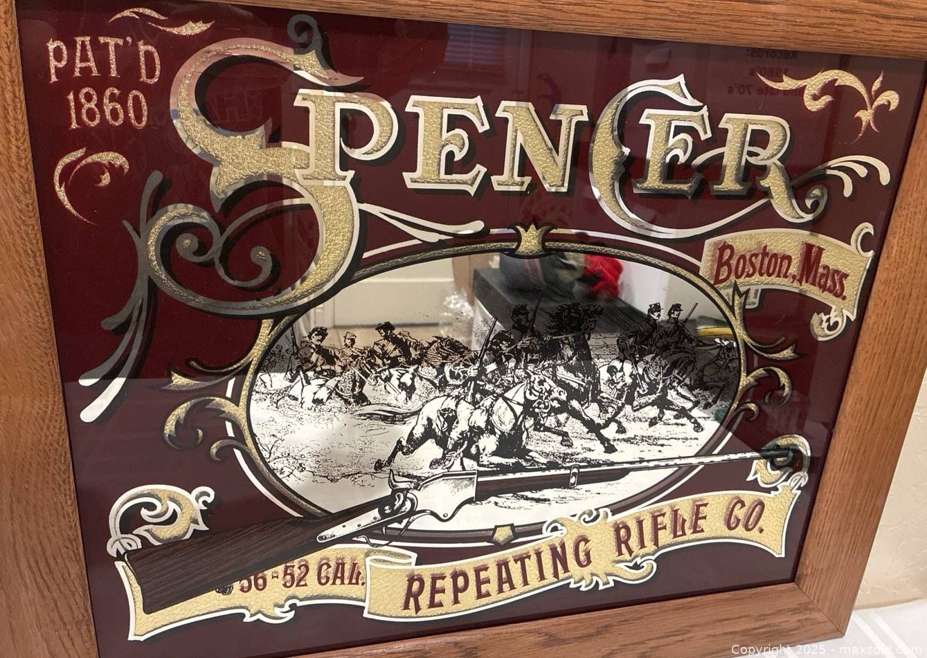 Framed Spencer Repeating Rifle Co. advertising mirror | Maxsold