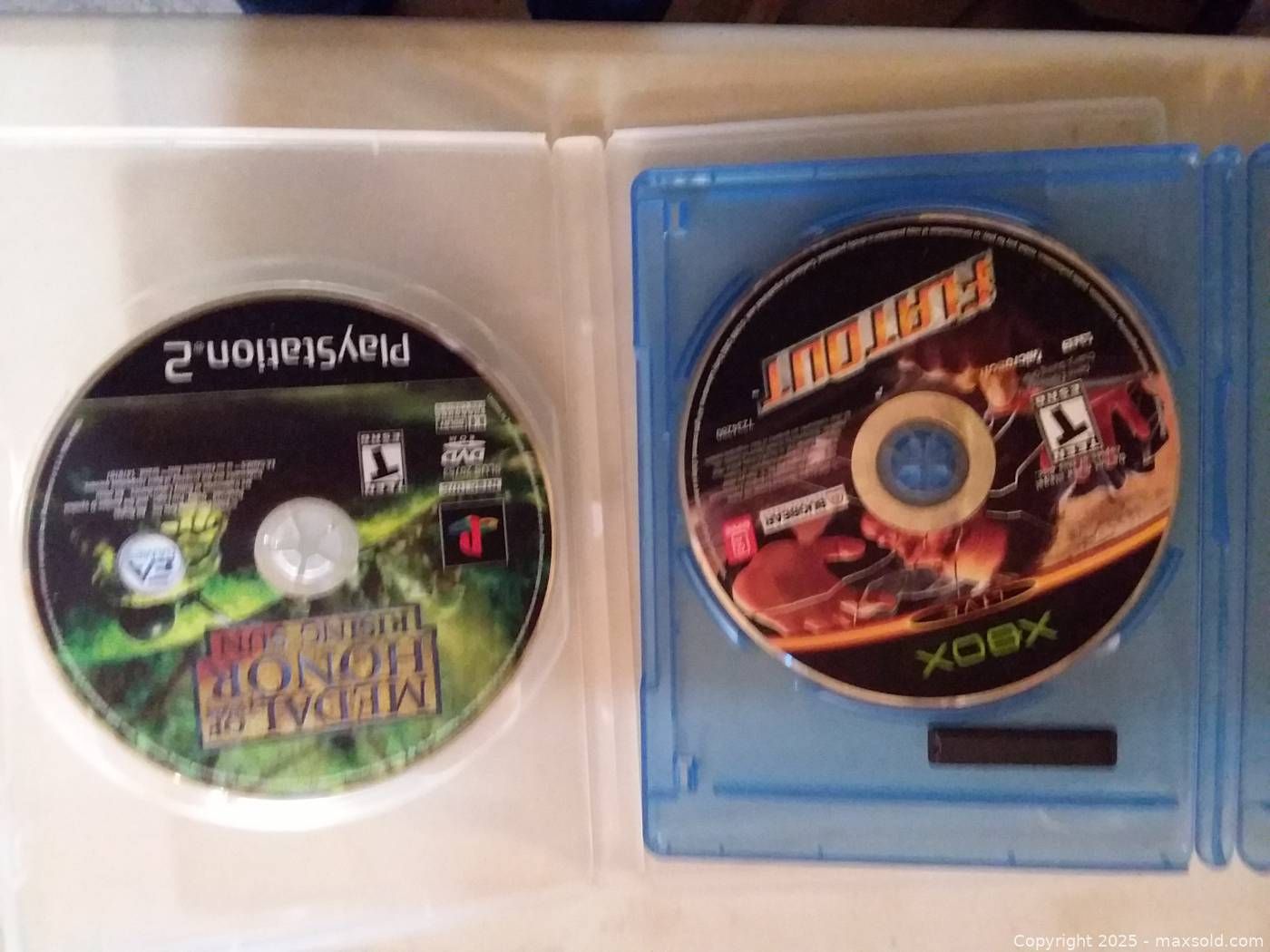 Two video game discs | Maxsold