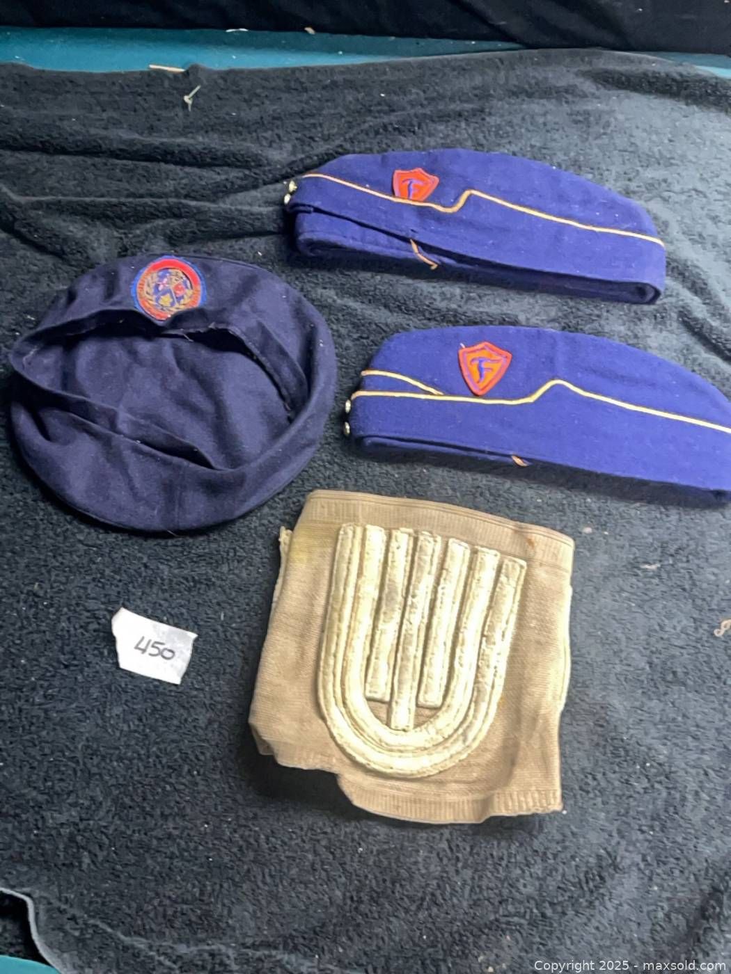 Firestone blue uniform caps and armband | Maxsold