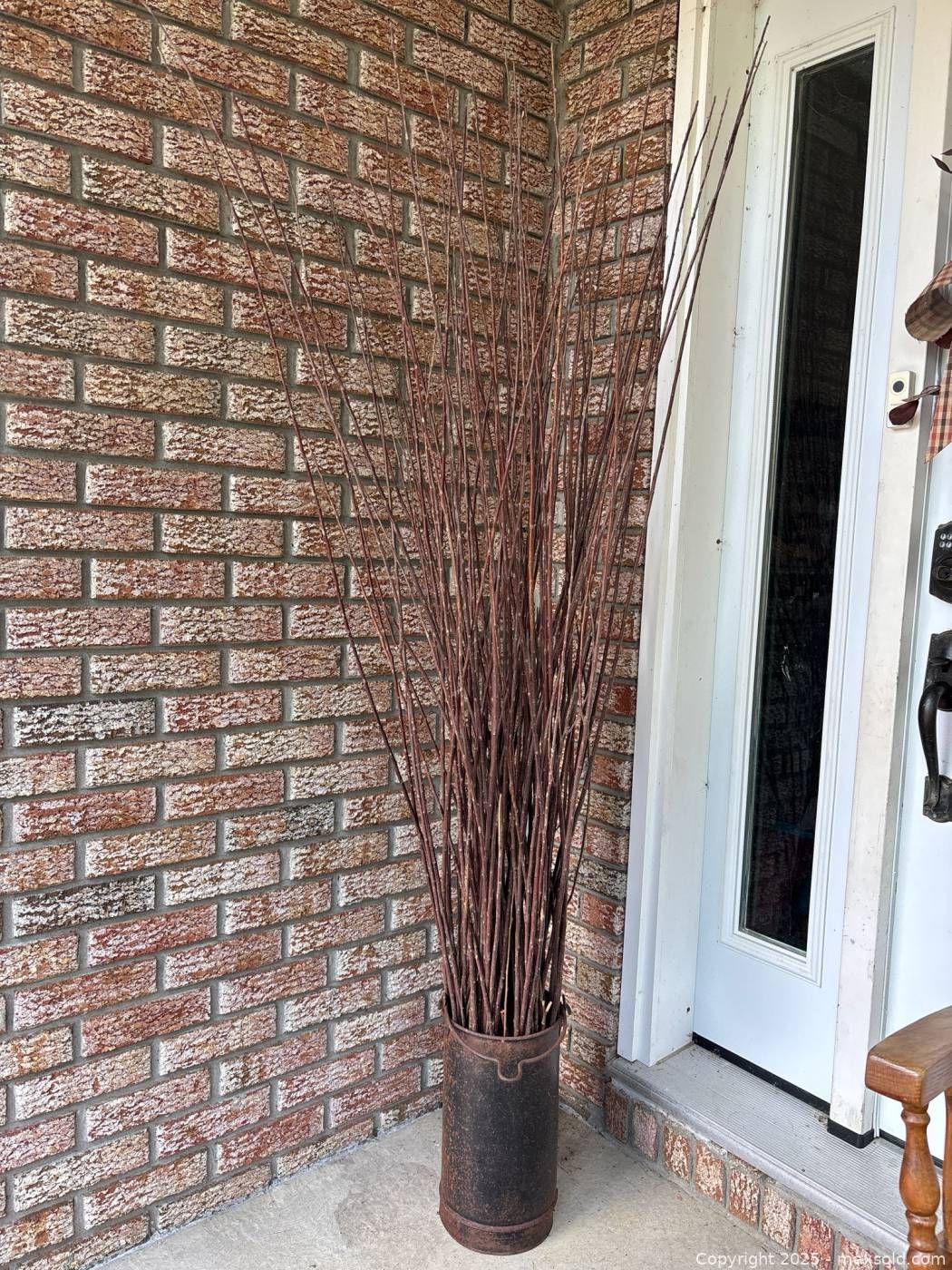 Natural wood branches bundle with metal pail | Maxsold