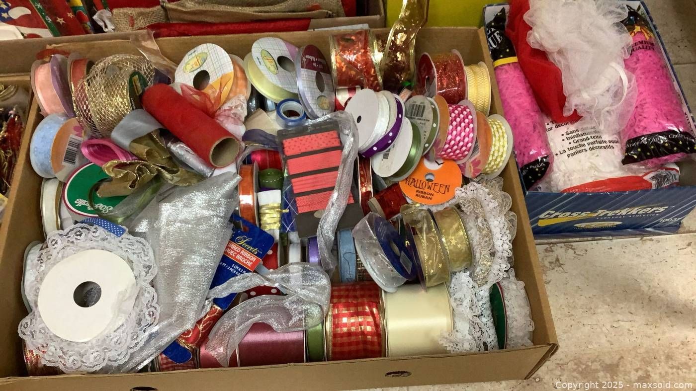 Large mixed lot wrapping paper, ribbons, gift bags, tissue packs | Maxsold