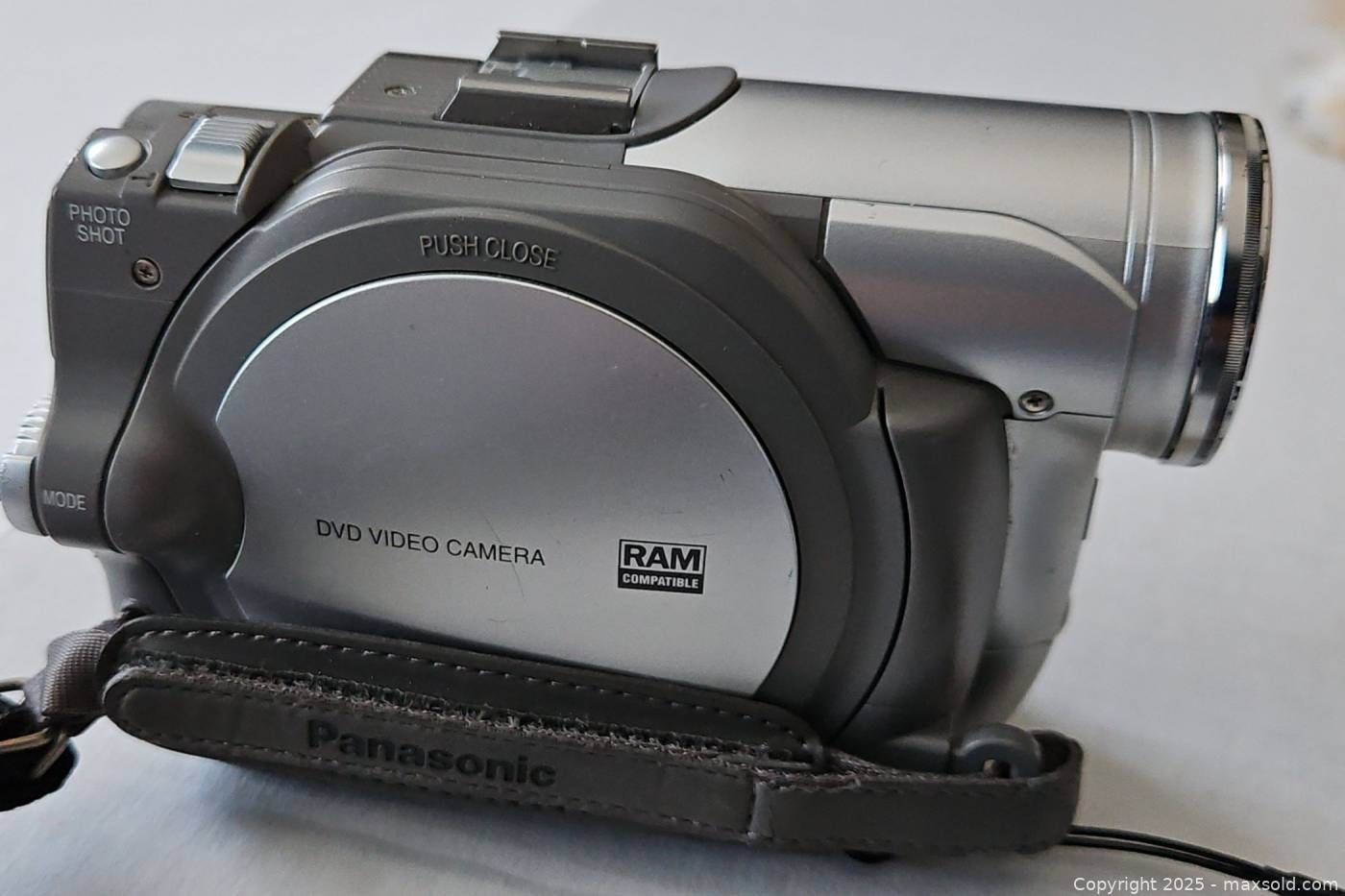 Panasonic DVD video camera with charger and mini DVDs | Maxsold