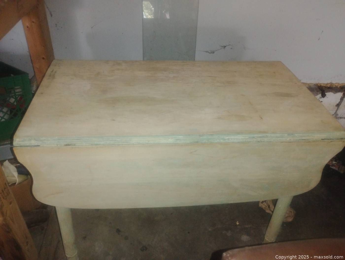 Antique solid wood drop-leaf kitchen table | Maxsold