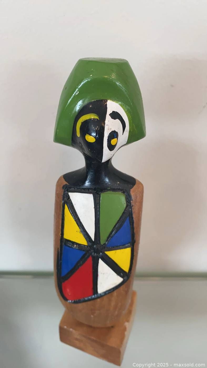 Frank Coronado painted wood figure | Maxsold