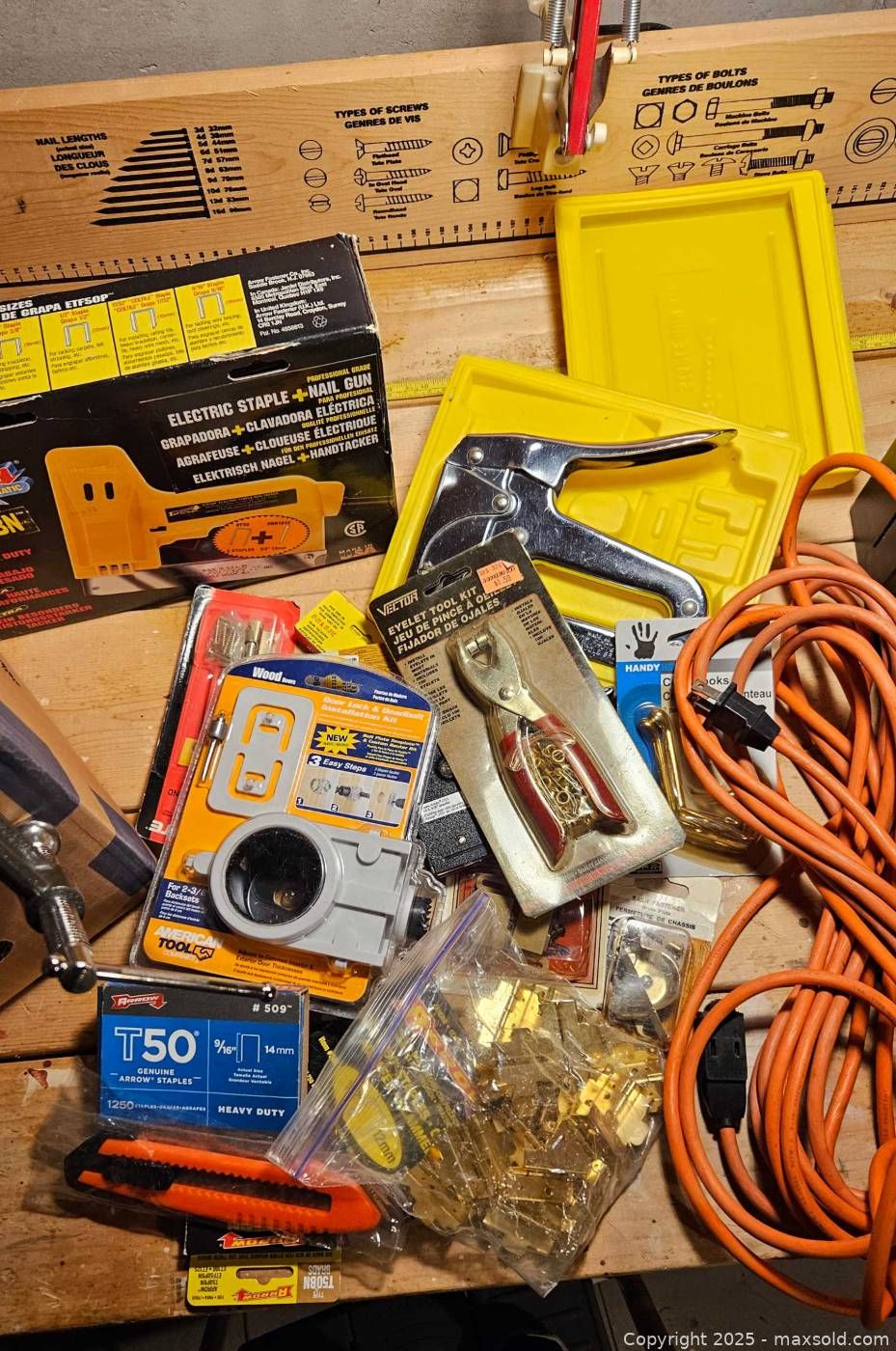 Electric stapler, extension cord, clamps and hardware | Maxsold