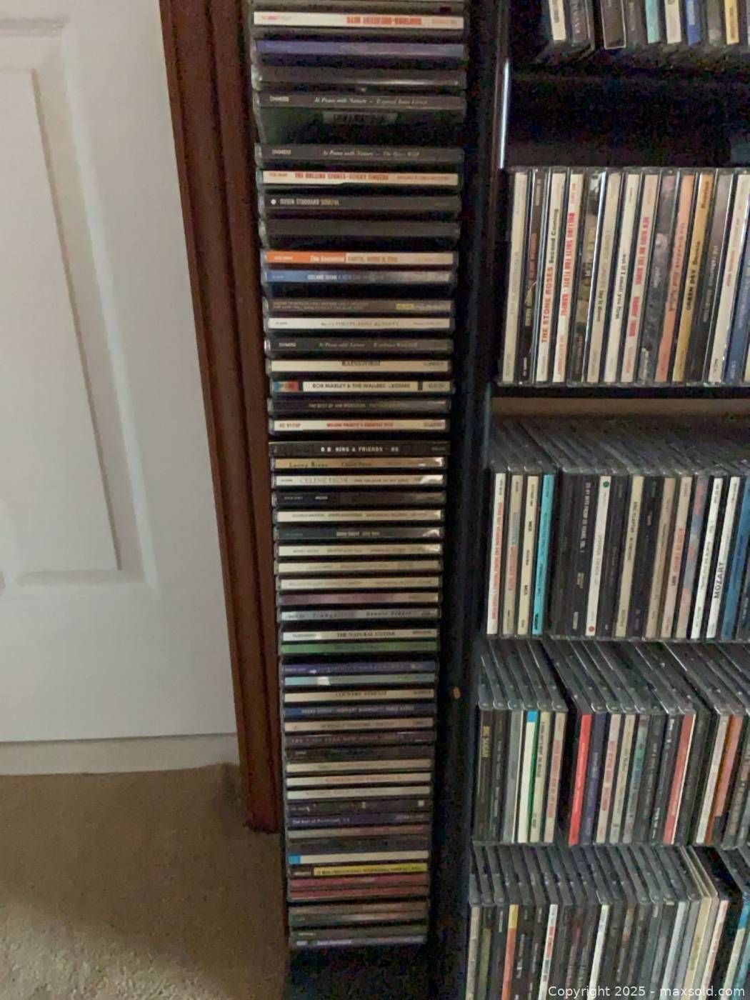 Large audio CD collection with racks | Maxsold