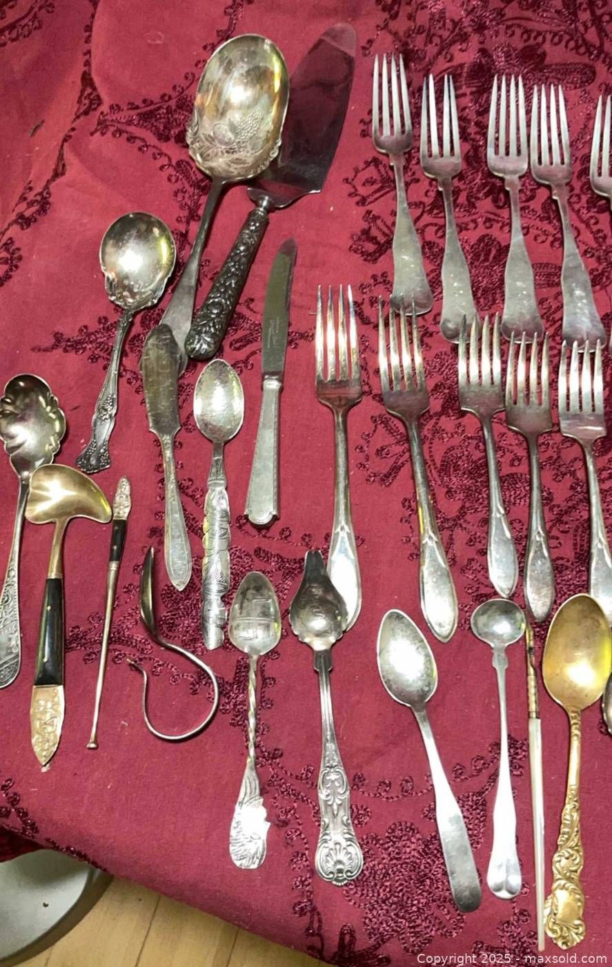 Assorted silverplate flatware, mirror, vanity comb | Maxsold