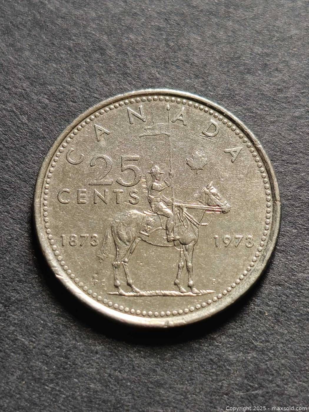 1973 Canadian Mounted Quarter | Maxsold
