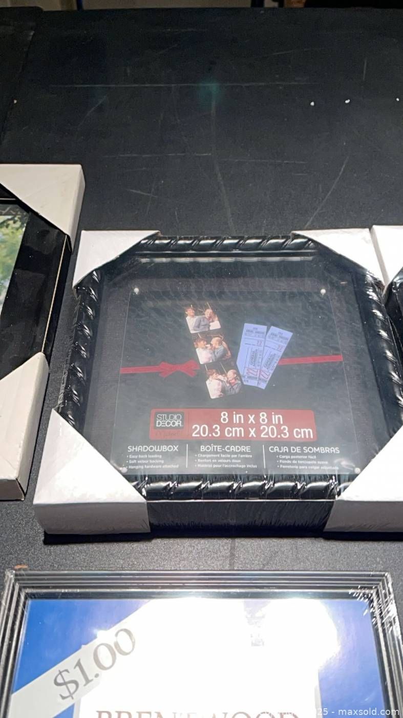 Eight assorted black photo frames | Maxsold