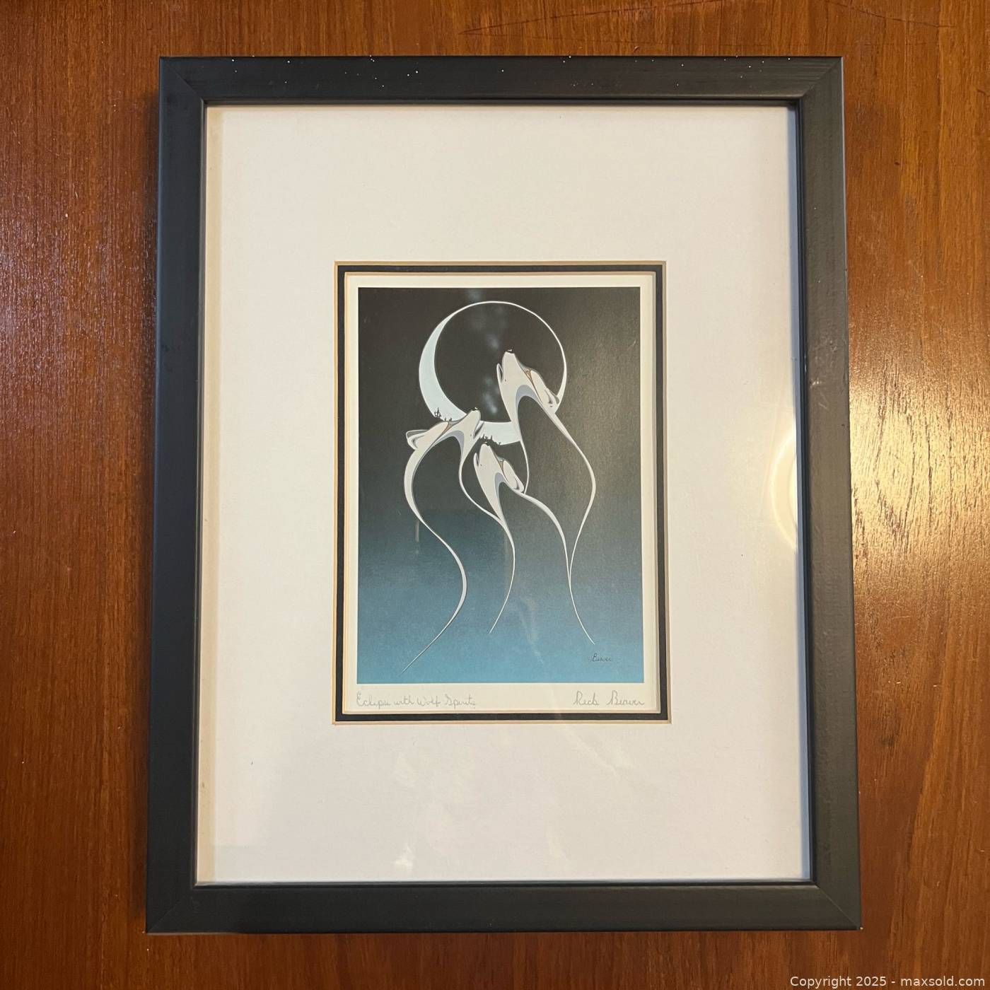 Framed Rick Beaver print Eclipse with Wolf Spirits | Maxsold