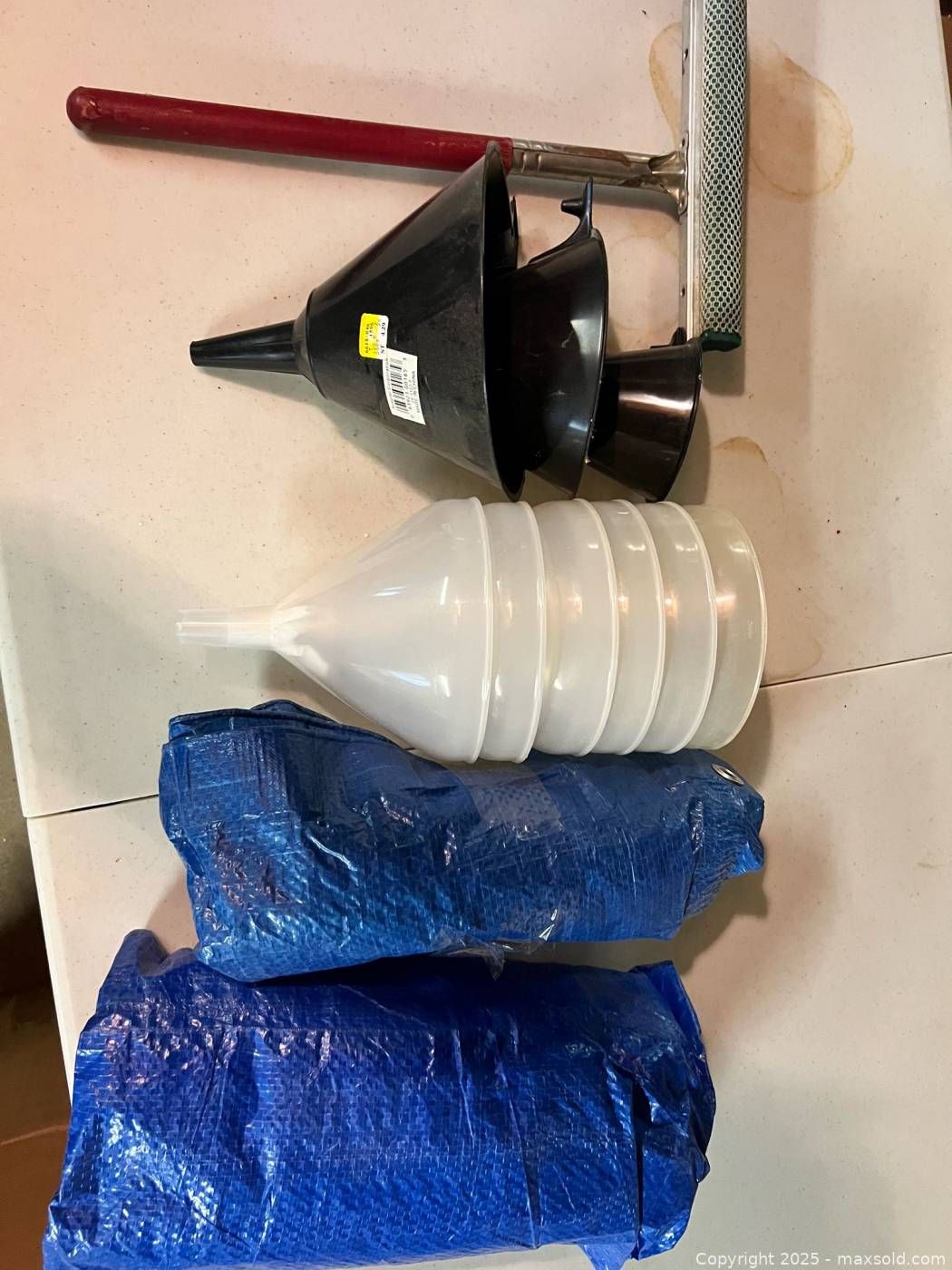 6 Clear Funnels, 3 Black Funnels, 2 Blue Tarps, Squeegee | Maxsold