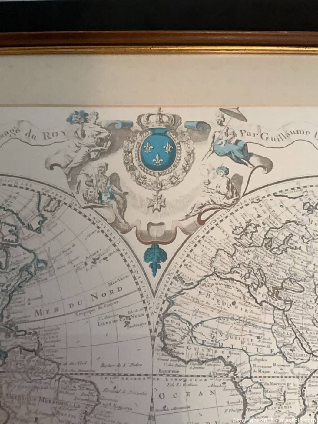 Framed double-hemisphere world map print with two cartographic wooden ...