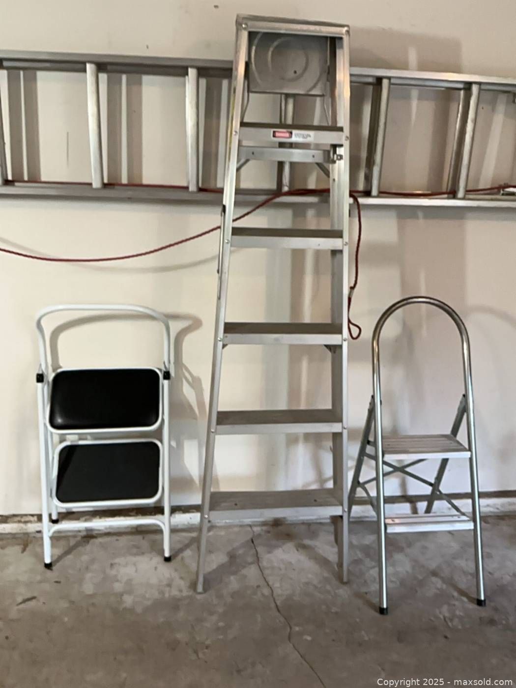 Aluminum extension ladder, 5-step ladder and two 2-step stools | Maxsold
