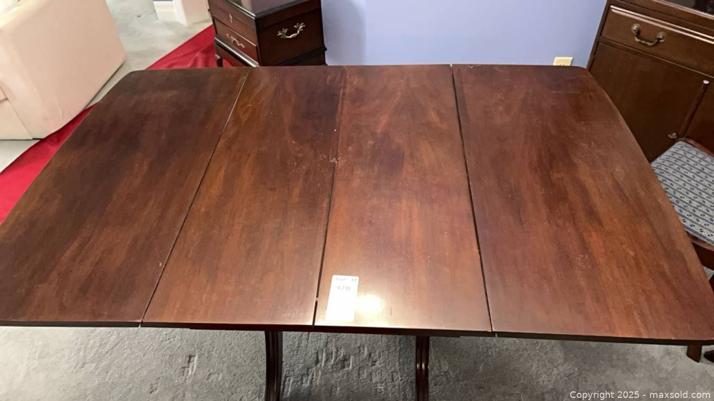 Antique double pedestal drop-leaf table | Maxsold