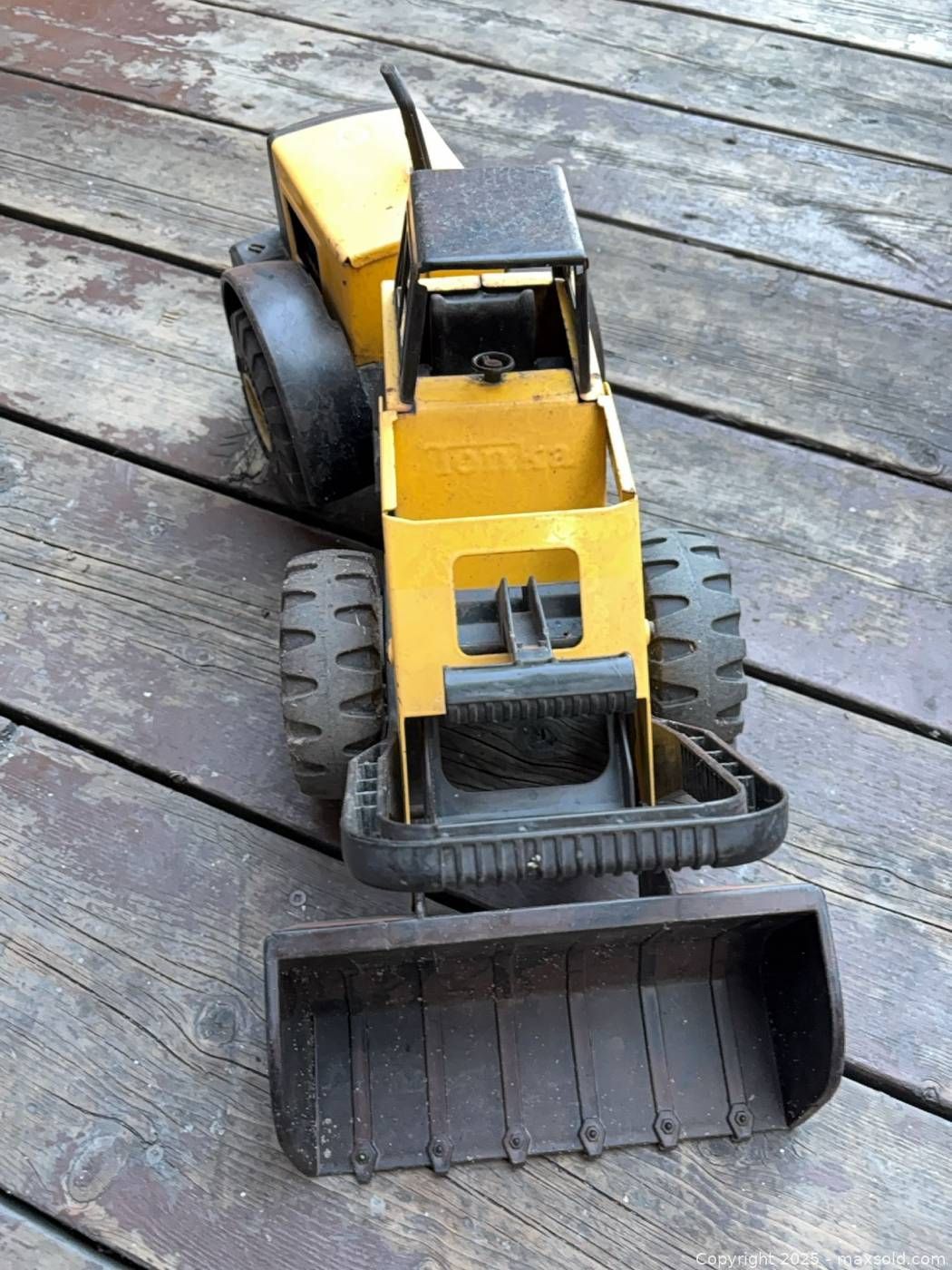 1997 Tonka metal and plastic loader | Maxsold