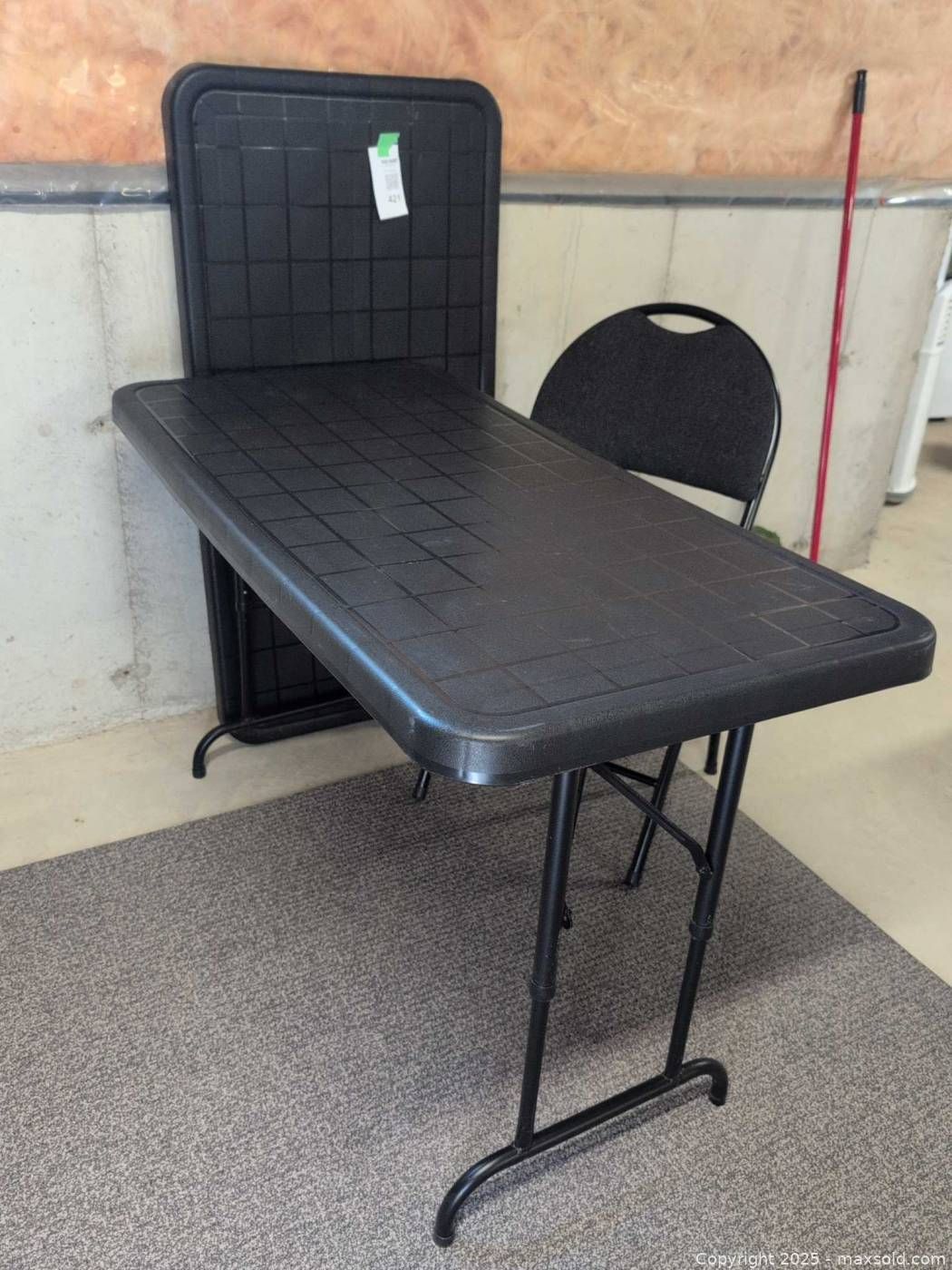 Two 4-Foot Black Folding Tables and Chair | Maxsold