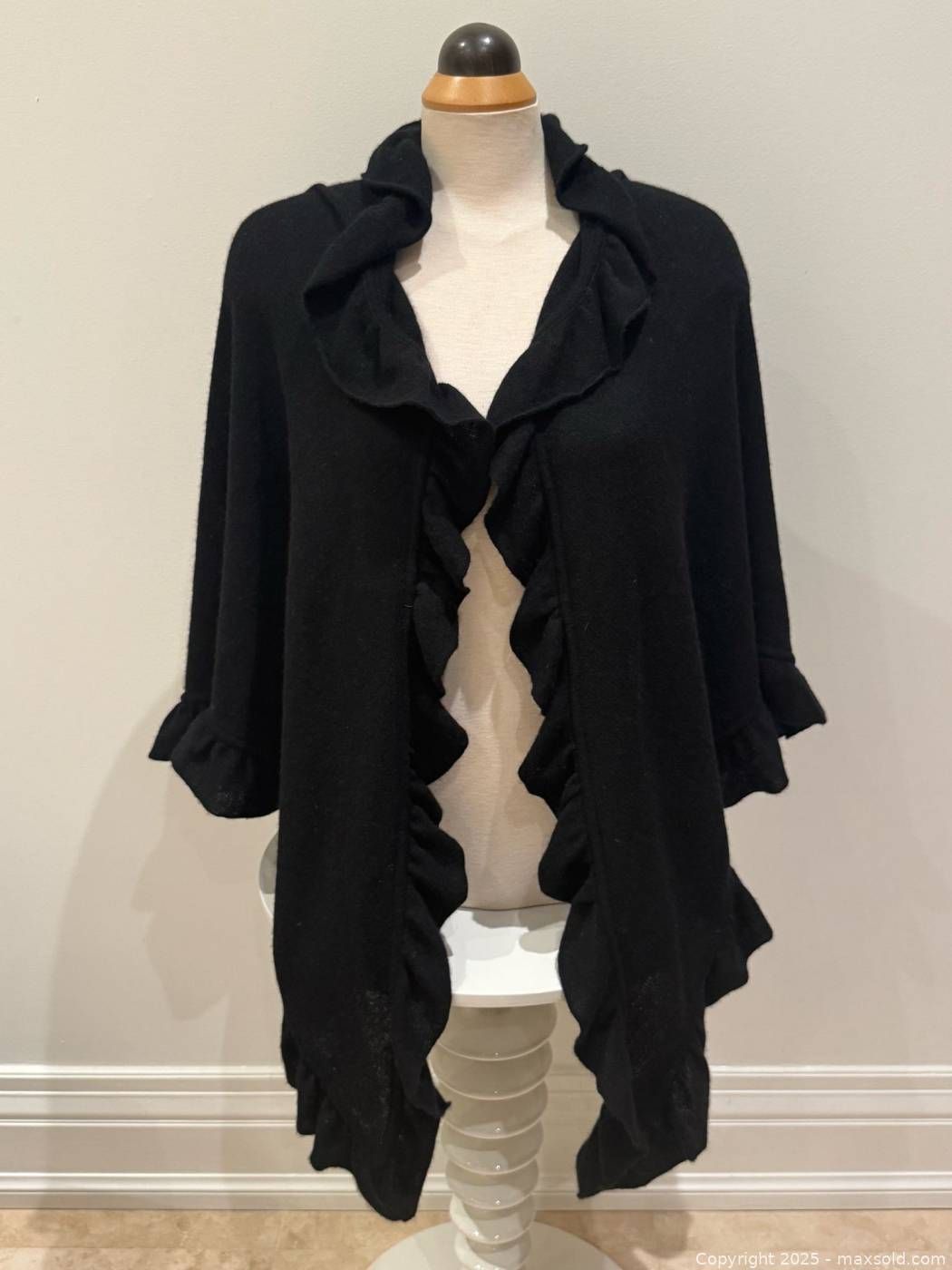 Repeat Cashmere ruffled black open-front cape | Maxsold