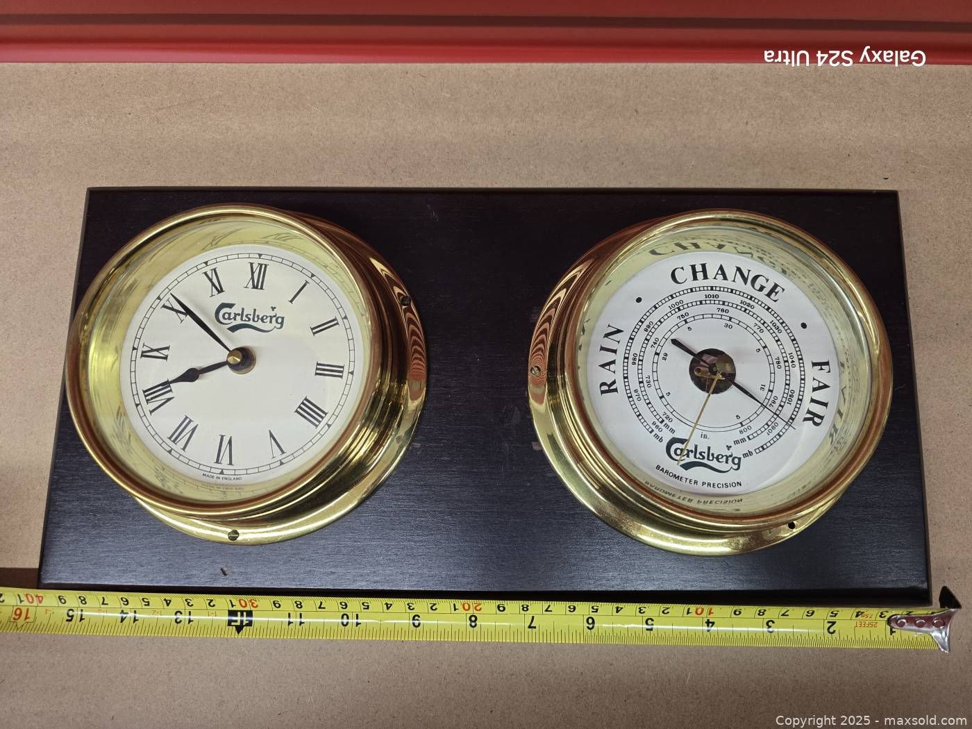 Carlsberg barometer and clock set on mahogany | Maxsold