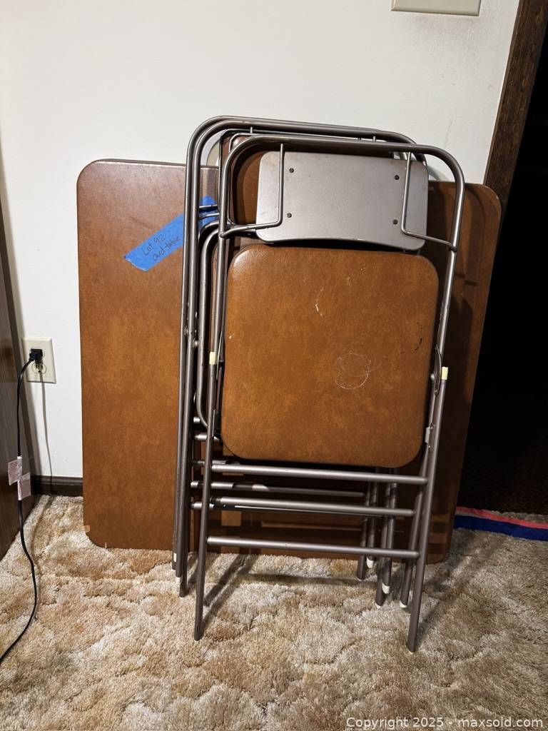 Two folding card tables with three matching folding chairs | Maxsold