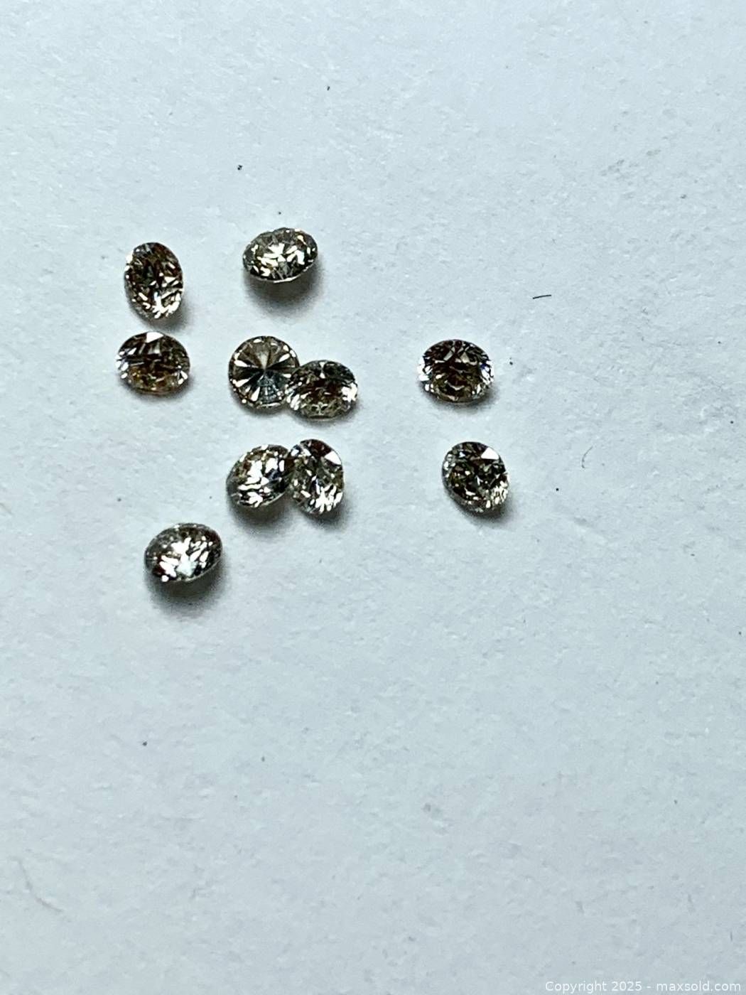 Ten VVS round brilliant diamonds 0.50 ct | Maxsold