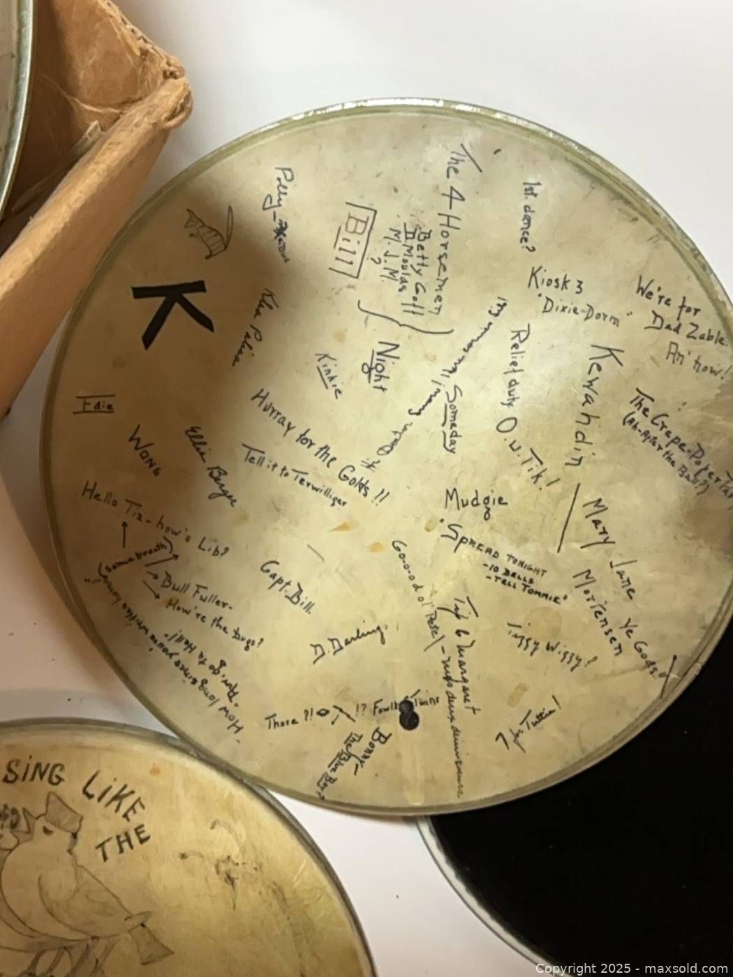 Antique wood and glass trapezoid display case, three cardboard banjo ...